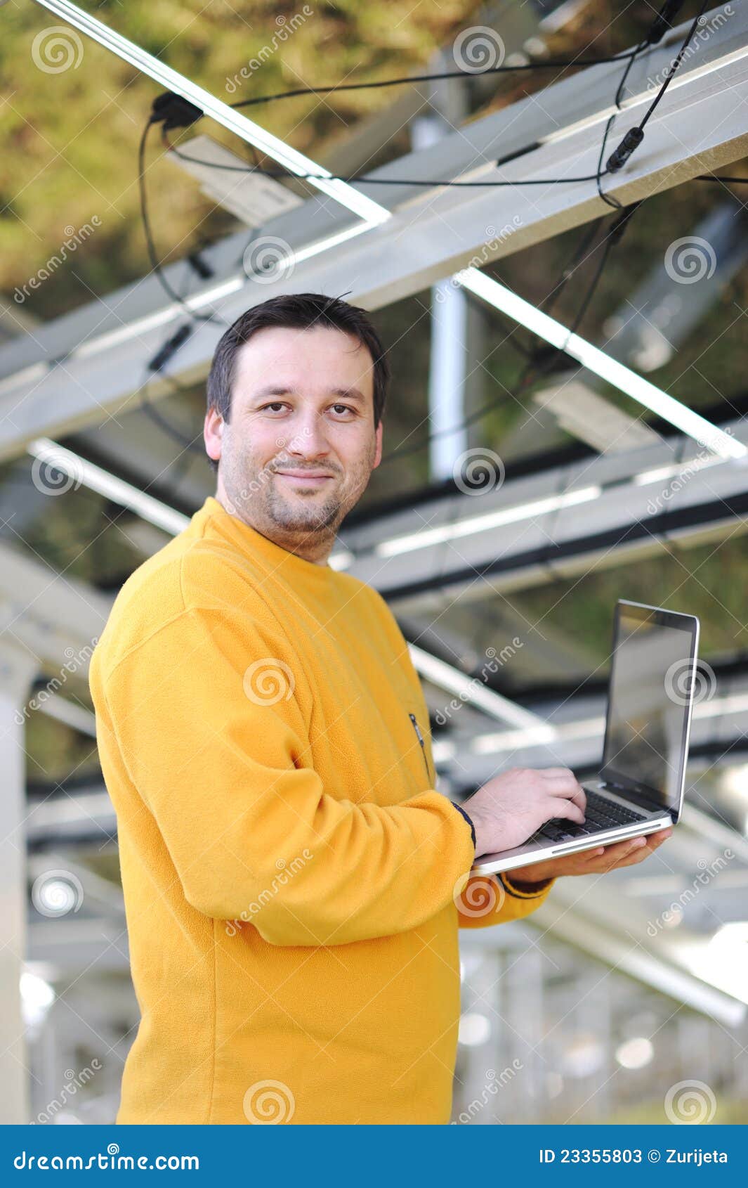 Engineer using laptop stock image. Image of holding, laborers - 23355803