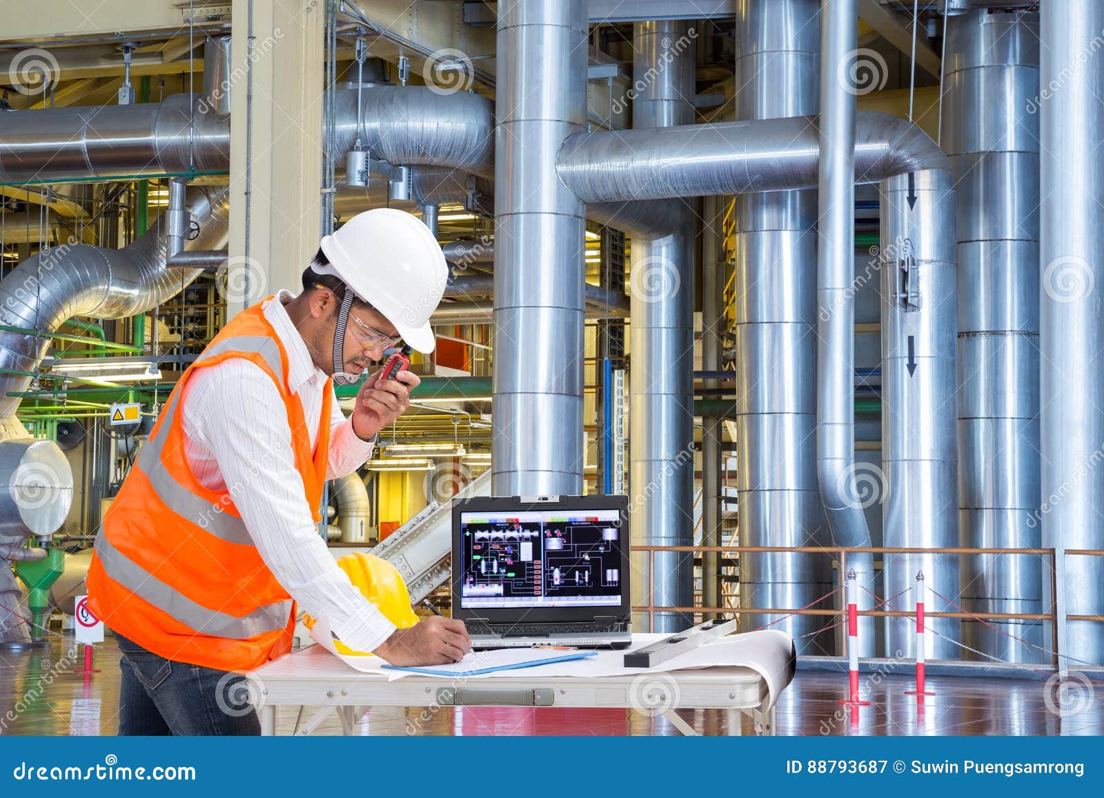 Engineer Using Laptop Computer for Maintenance Equipment in Thermal ...