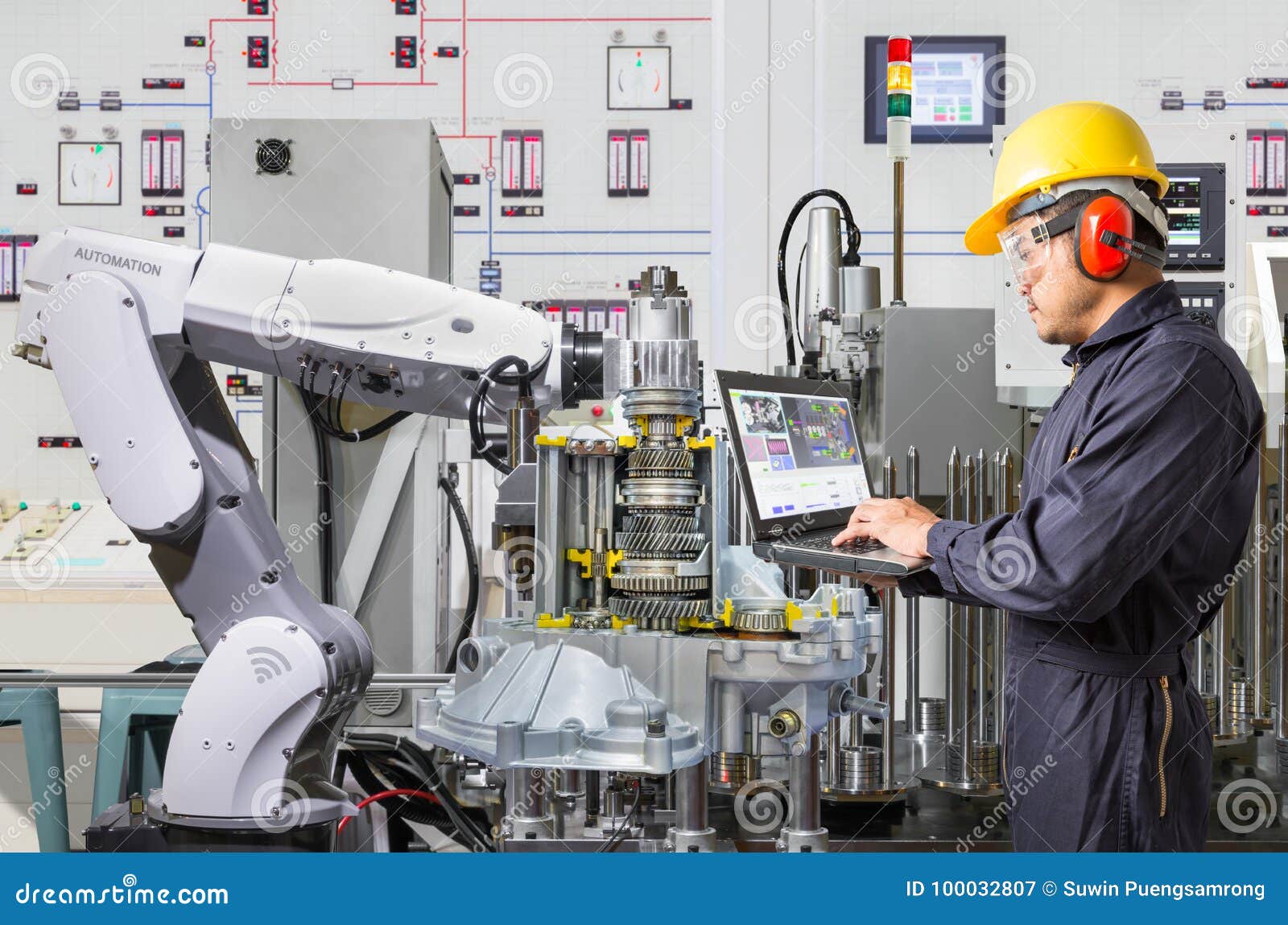 Engineer Using Laptop Computer for Maintenance Robotic Industry Stock ...