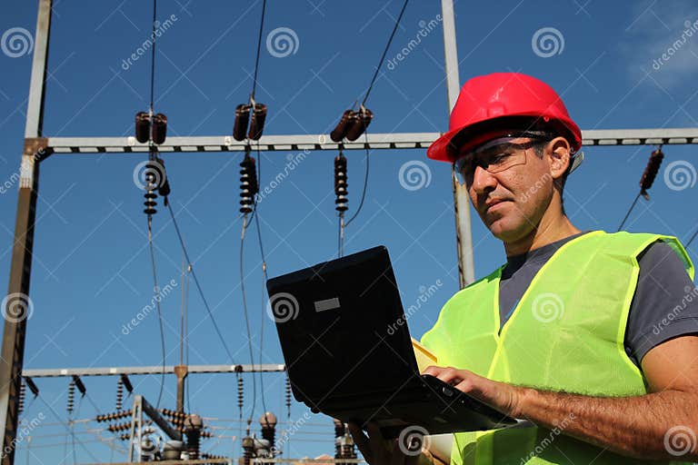 Engineer Using Laptop at an Electrical Substation. Stock Image - Image ...