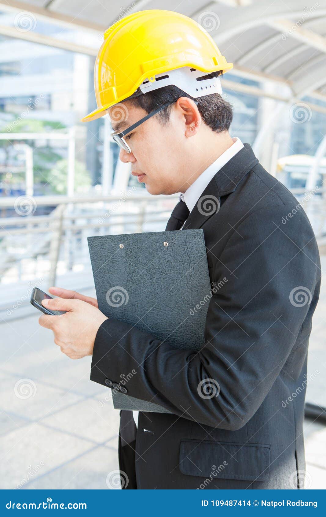 Engineer is Using the Mobile Phone Digital Tablet Stock Photo - Image ...