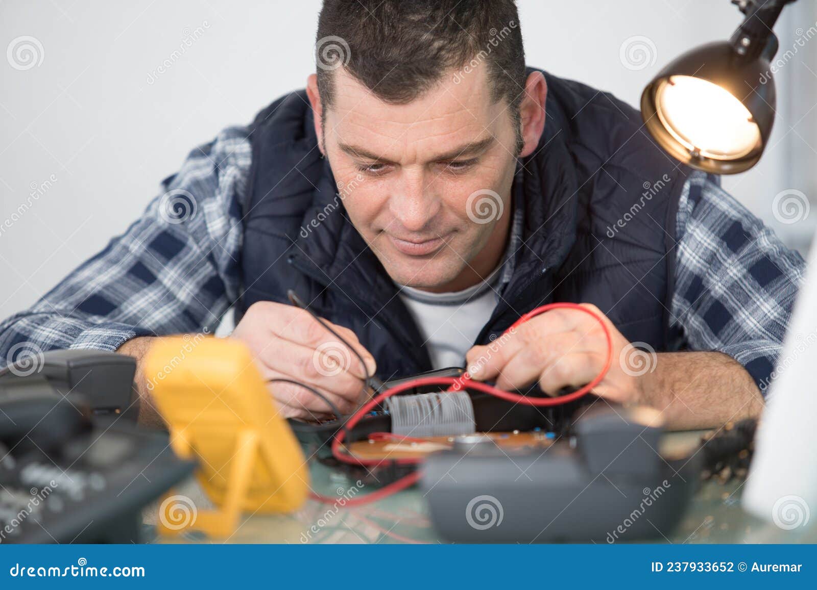 Engineer Using Multimeter To Test Telephone Handset Stock Photo - Image ...