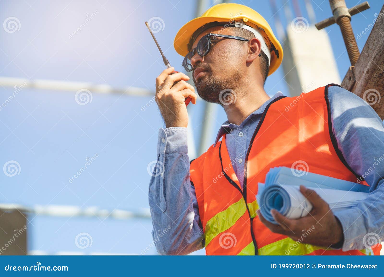 Engineer Using Radio To Command To Labour Team in Site Construction ...