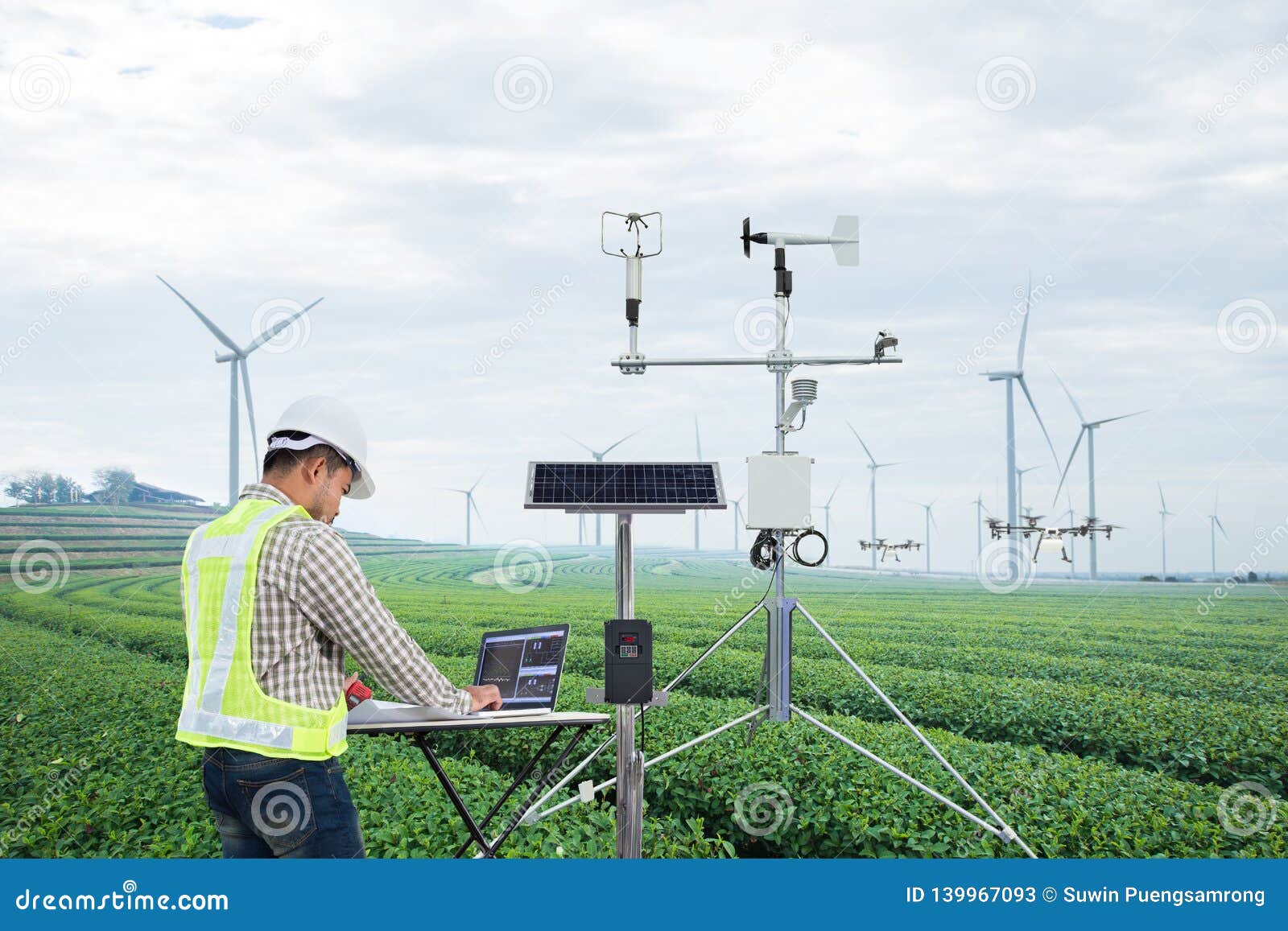 Engineer Using Tablet Computer Collect Data with Meteorological ...
