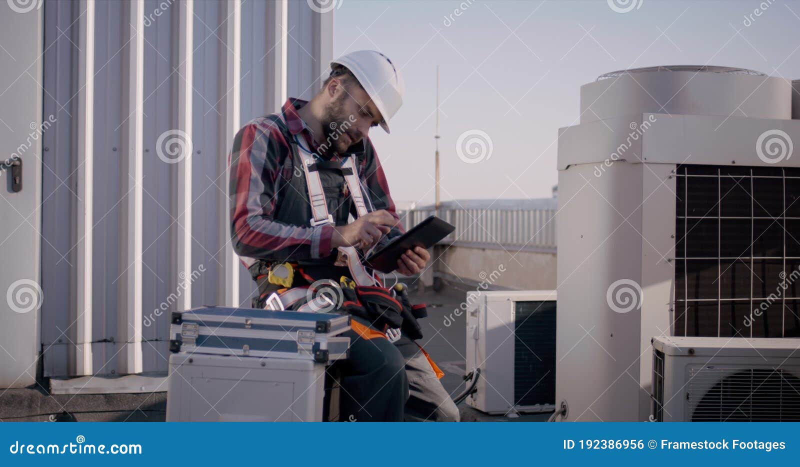 Engineer Using a Tablet while Having a Phone Call Stock Footage - Video ...