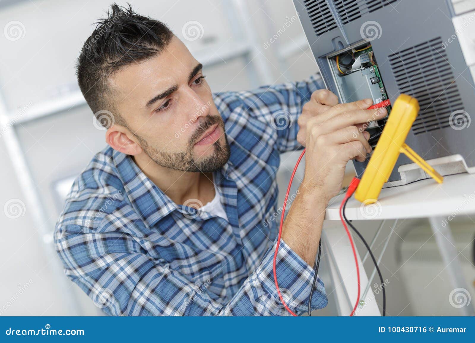 Engineer Using Voltage and Current Tester Stock Photo - Image of people ...