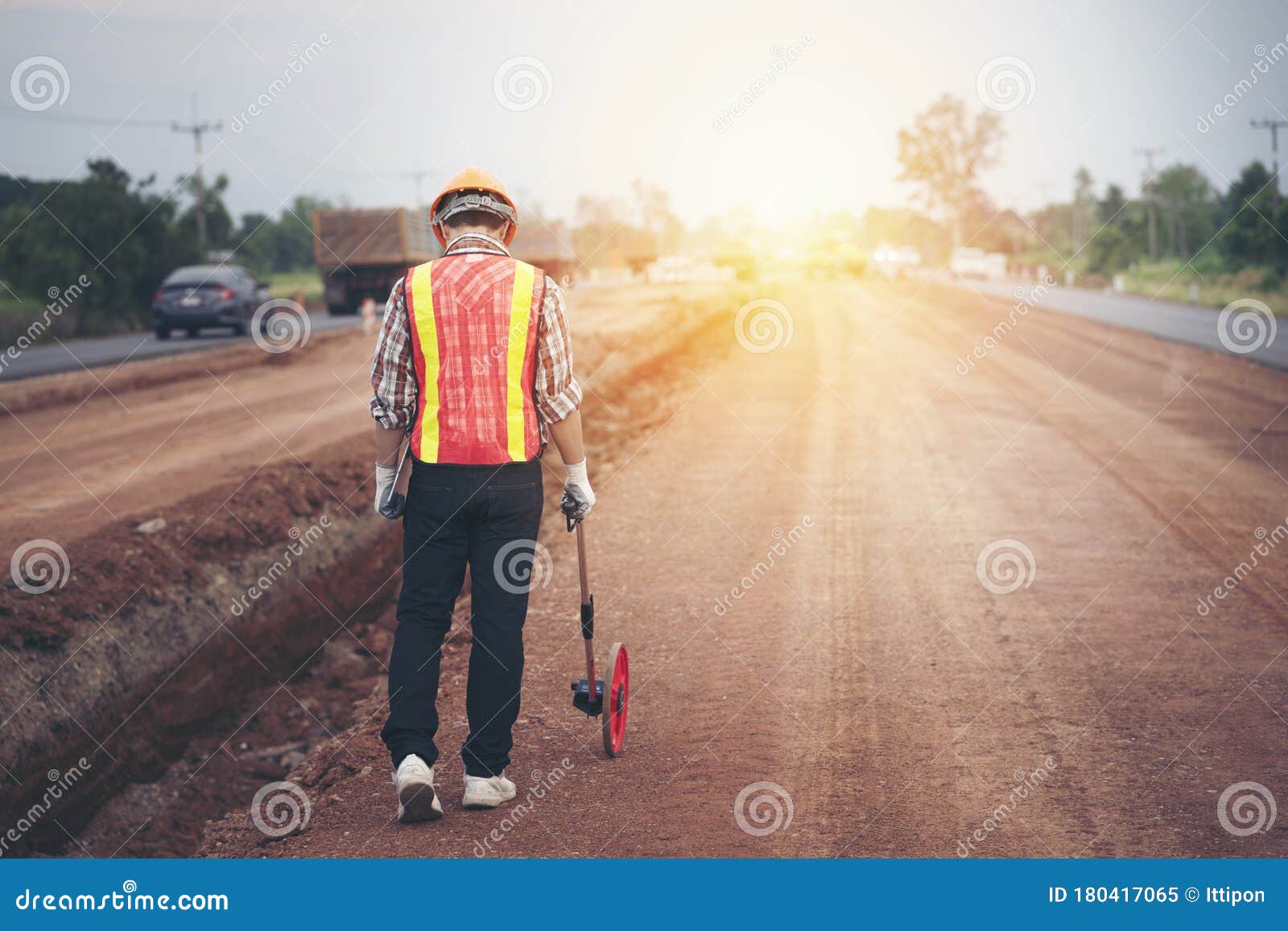 Engineer Walking with the Measuring Wheel Stock Image - Image of ...