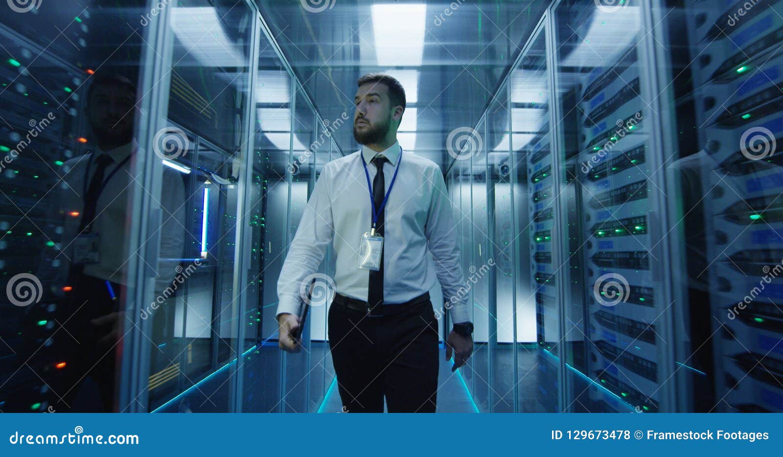 Engineer Walking among Server Racks Stock Photo - Image of intelligence ...