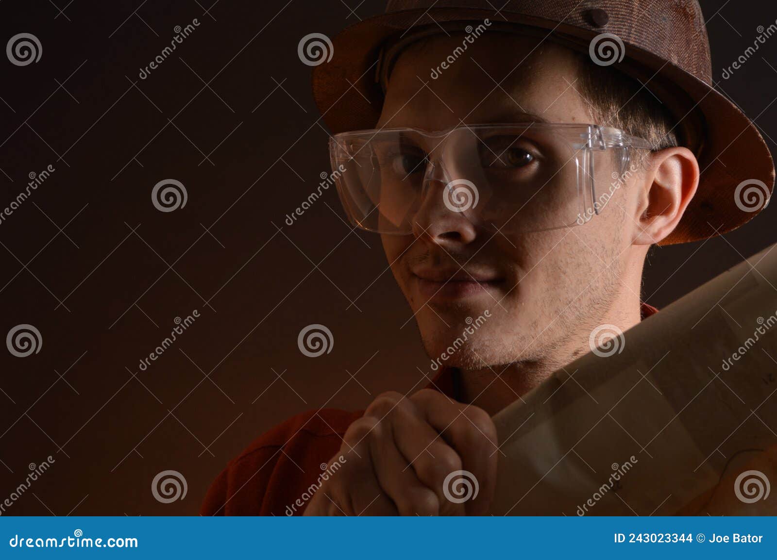 Engineer Wearing Hard Hat while Holding Map Stock Photo - Image of ...