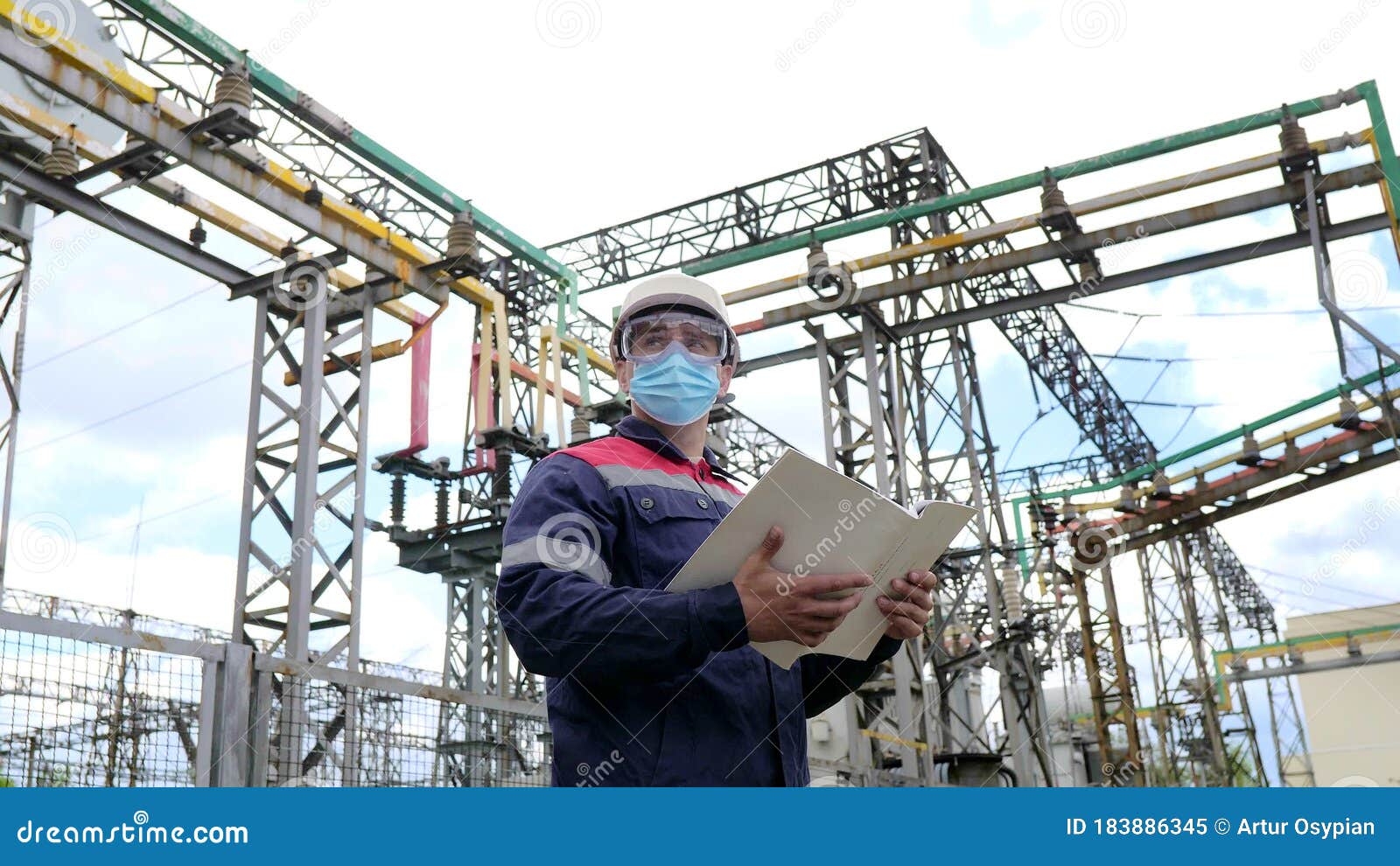 Engineer Wearing Protective Mask Against Covid-19 Working on Checking ...