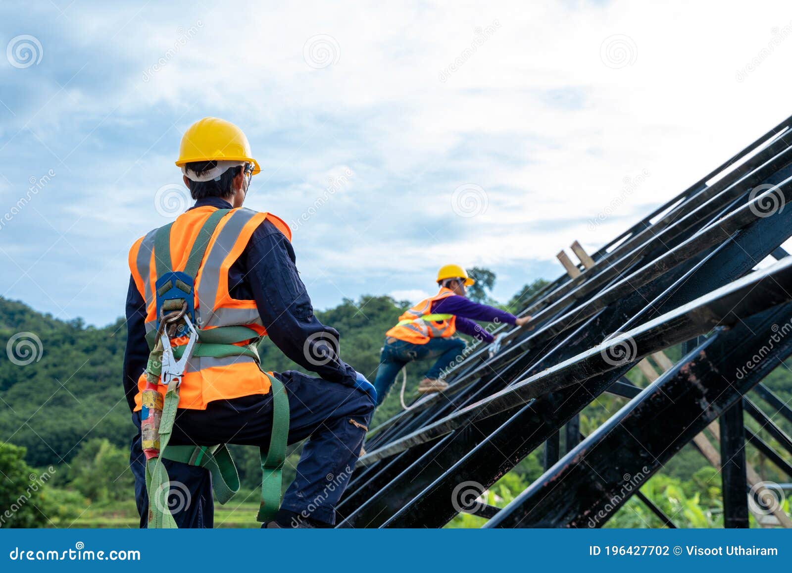 Engineer Wearing Safety Harness and Safety Line Working at High Place ...