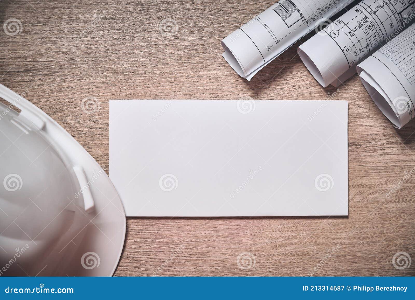 Engineer Hardhat, Rolled Drawings and Blank White Envelope at Wooden ...
