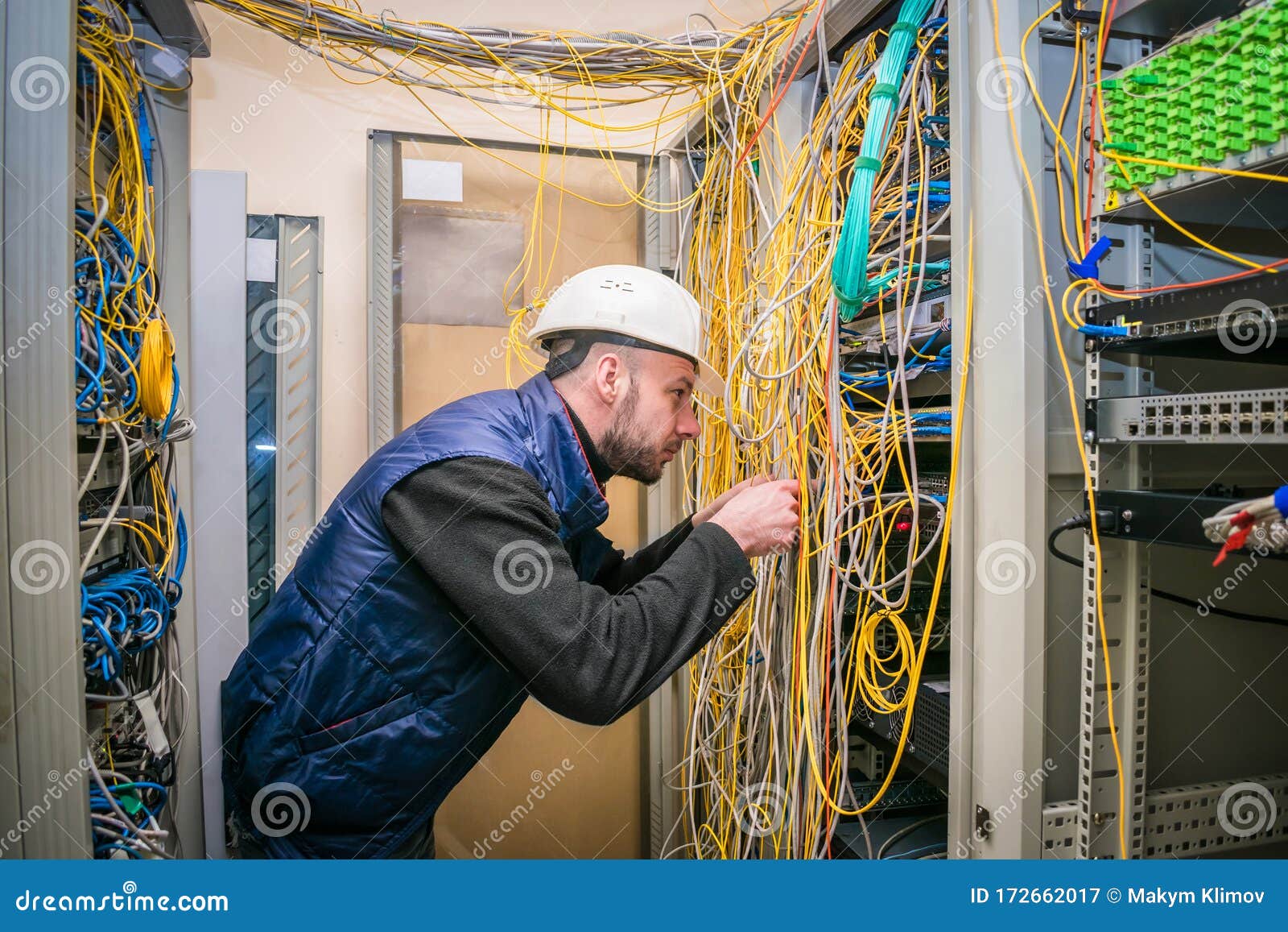 A Technician Commutes Many Trouble-free Wires In The Data Center Server ...