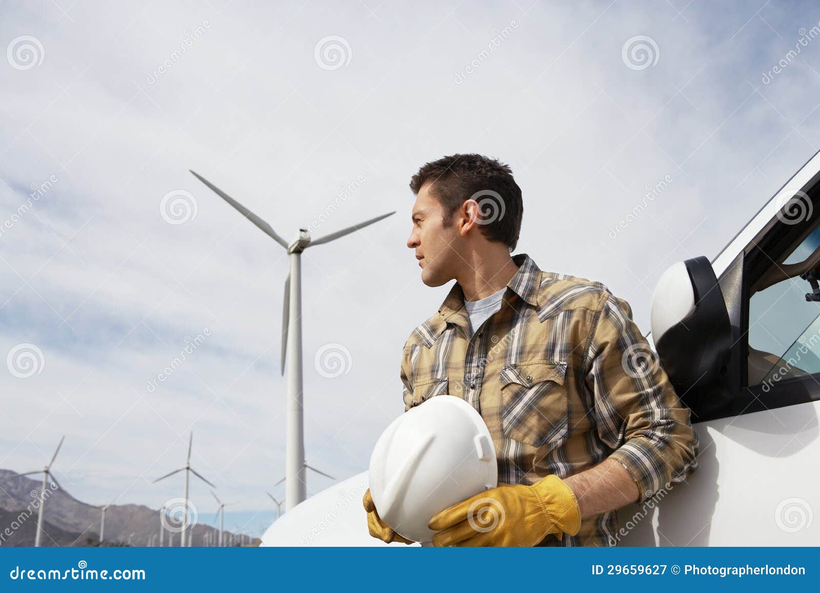 Engineer at Wind Farm stock image. Image of protection - 29659627