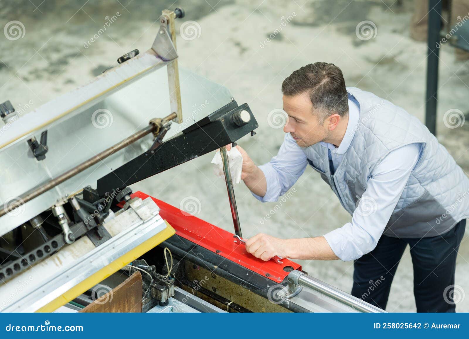 Engineer Wiping Part Industrial Machine with Rag Stock Photo - Image of ...