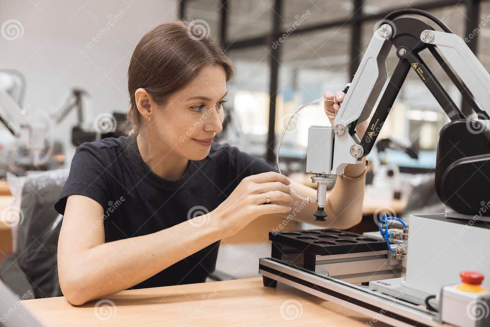 Engineer Women Learning Education in Industrial Robotics Program with Robot Arm Simulation Model ...