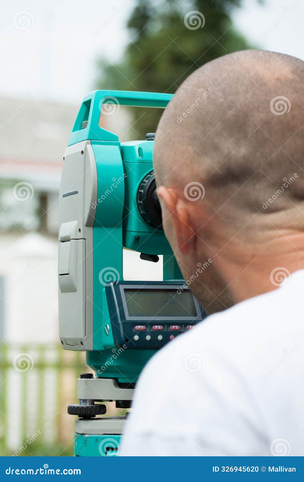An Engineer at Work with a Total Station Stock Photo - Image of ...
