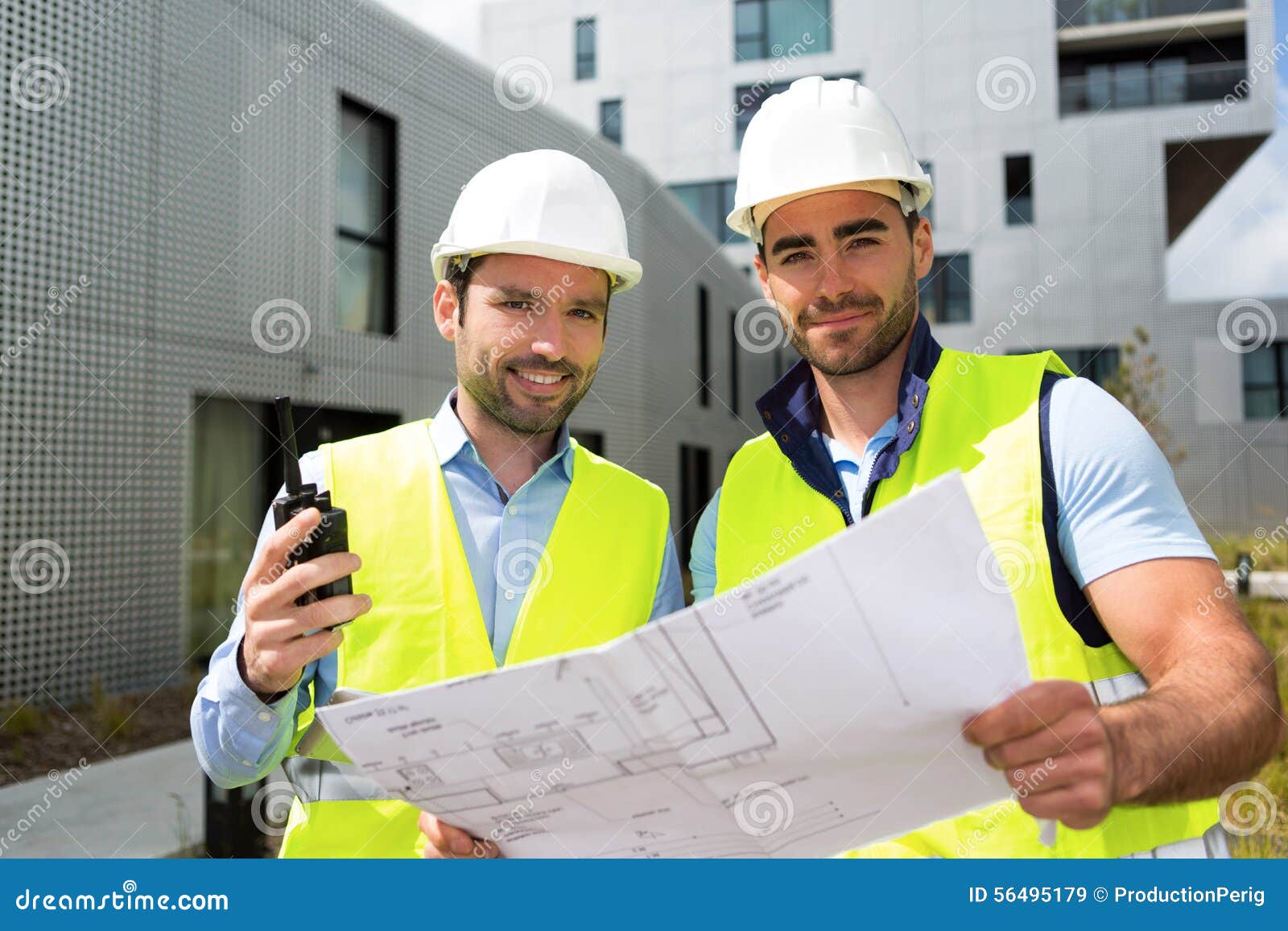 Engineer and Worker Checking Plan on Construction Site Stock Image ...
