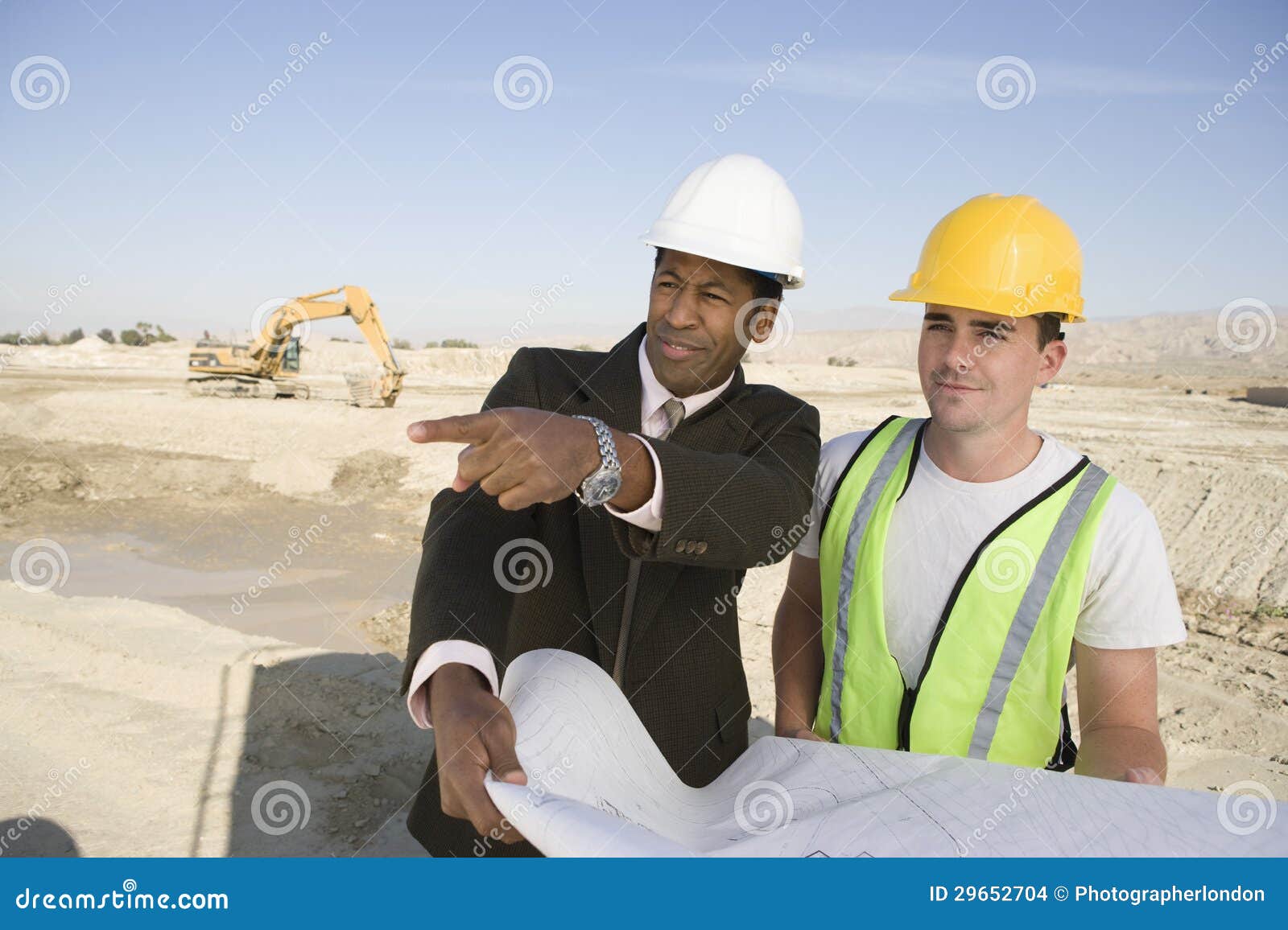 Engineer and Worker in Discussion at Site Stock Photo - Image of people ...