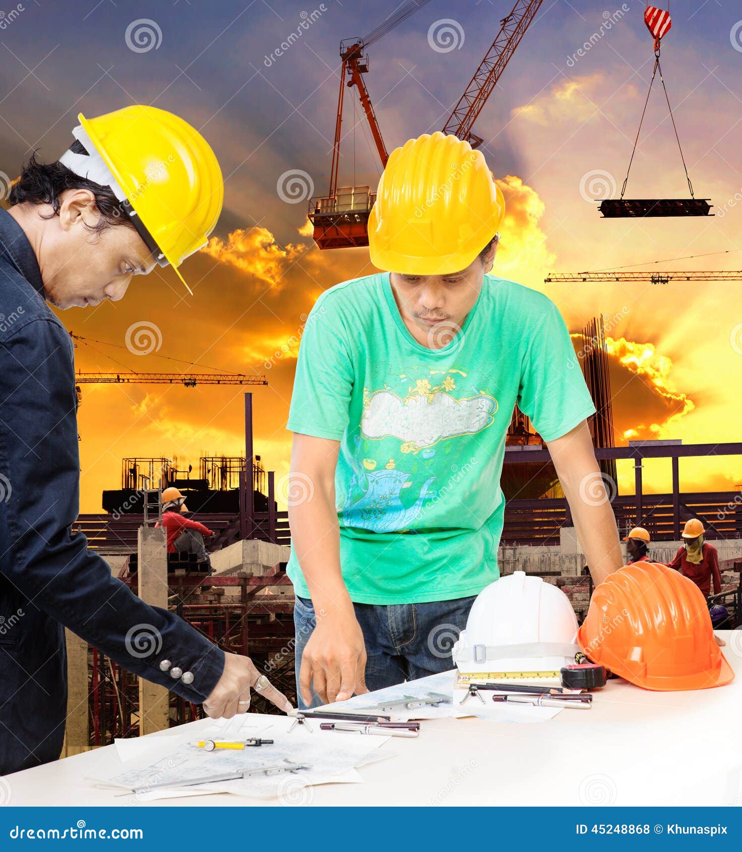 Engineer and Worker Man Working in Building Construction Site Wi Stock ...