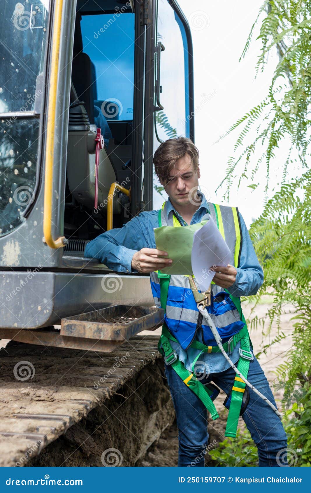 Engineer or Worker Reading Manual or Work Order before Driving ...