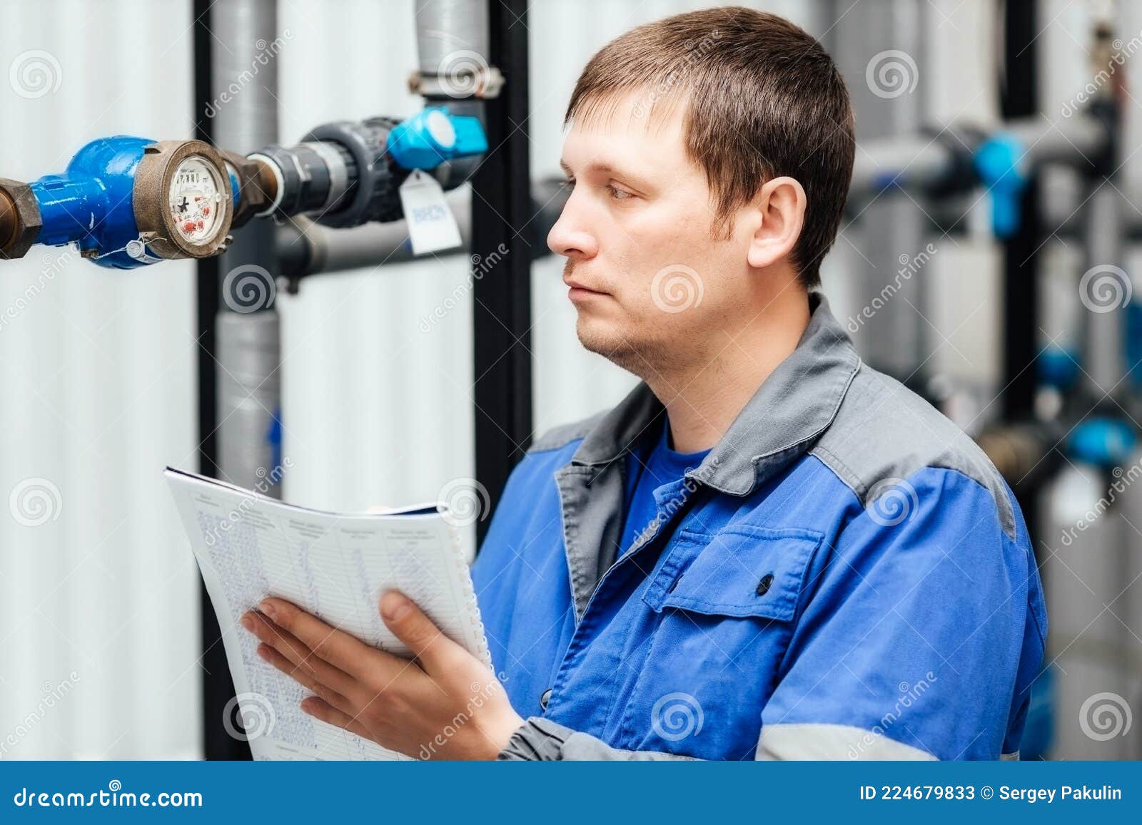 Engineer, Worker Registers Readings of Sensors and Pressure Gauges ...