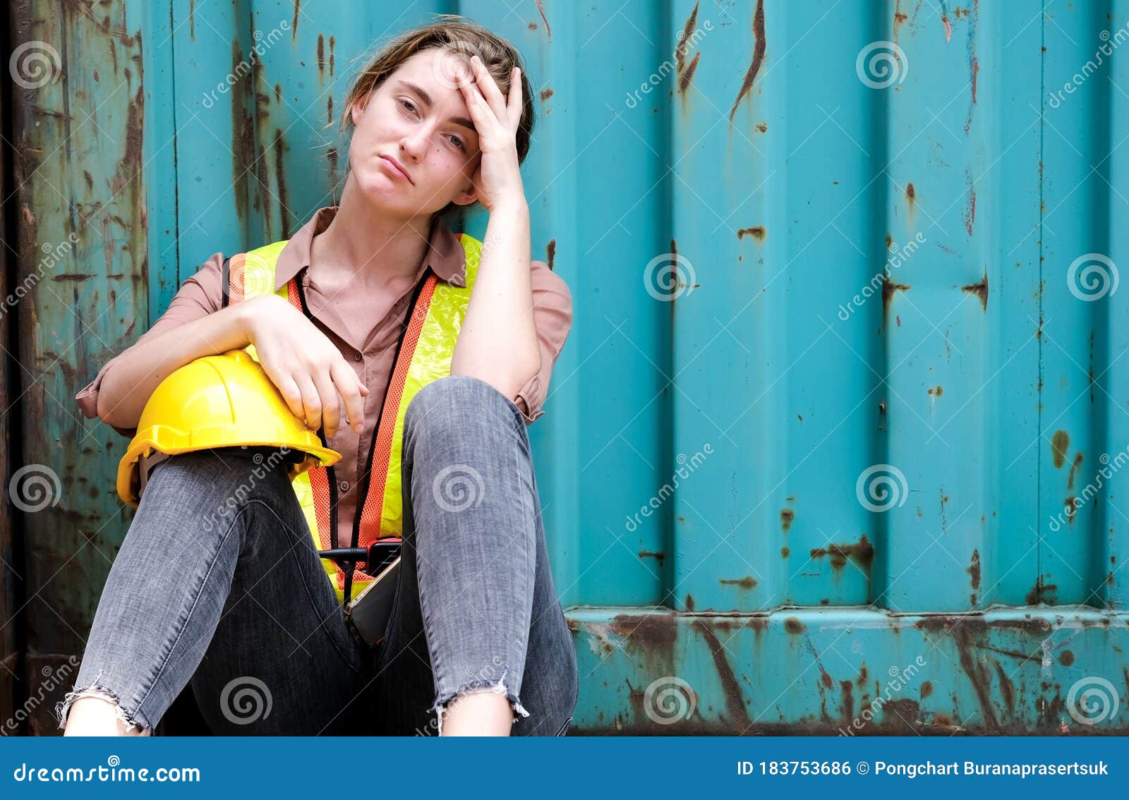 Engineer Worker Sitting on the Floor in Front of the Container, Feeling ...