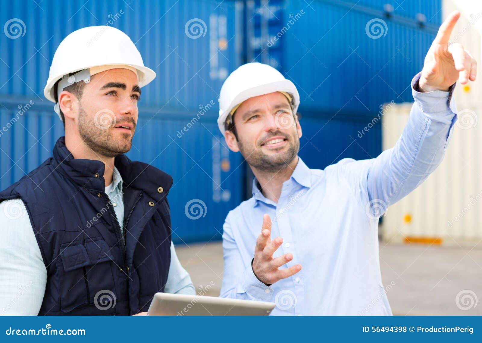 Engineer and Worker Speaking about Work on the Dock Stock Photo - Image ...