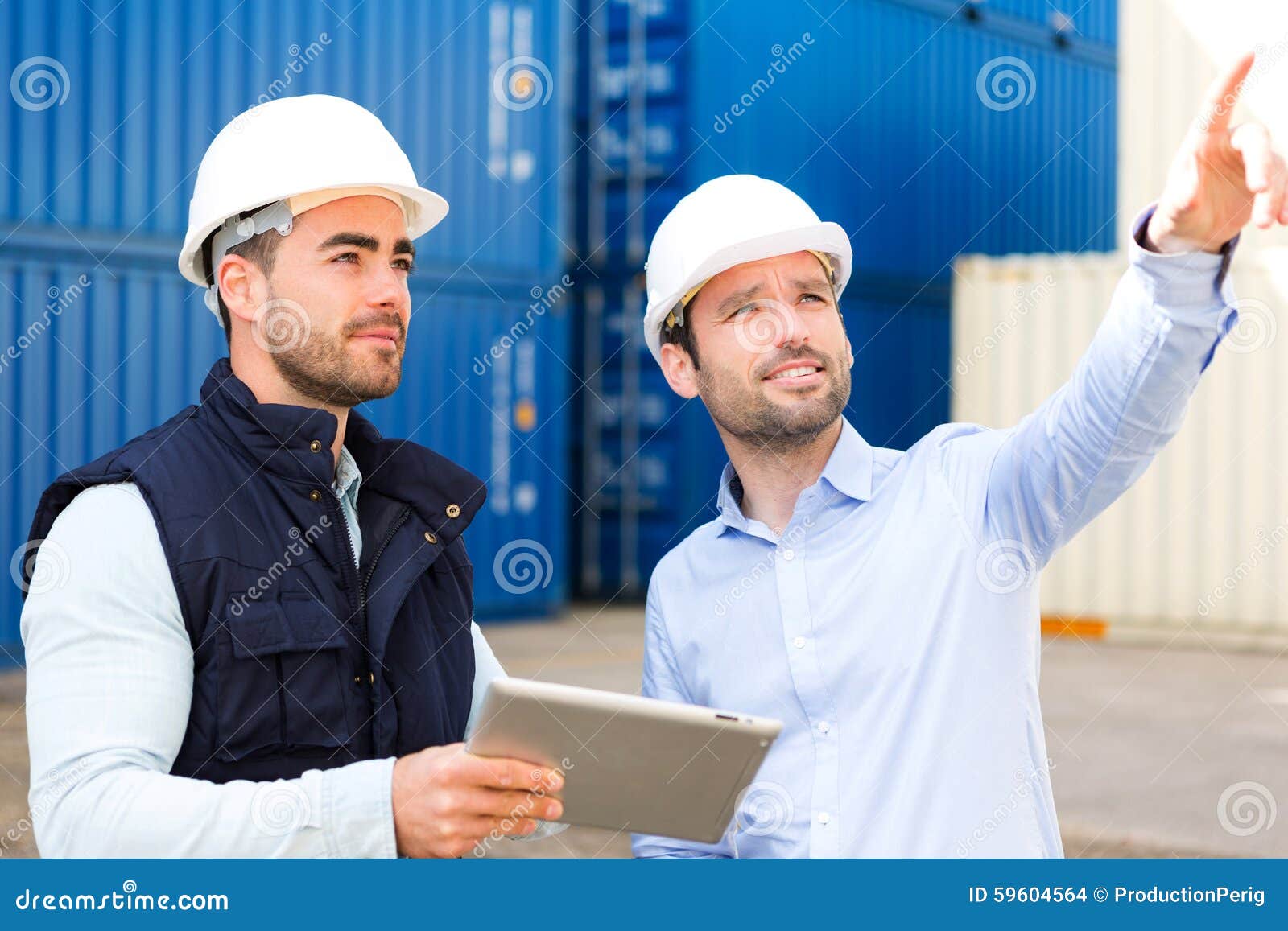Engineer and Worker Speaking about Work on the Dock Stock Photo - Image ...