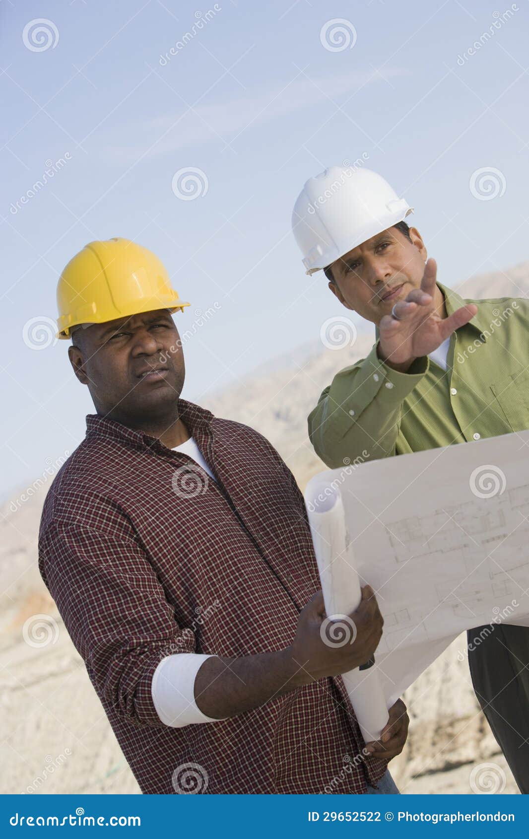 Engineer Worker Talking at Construction Site Stock Photo - Image of ...