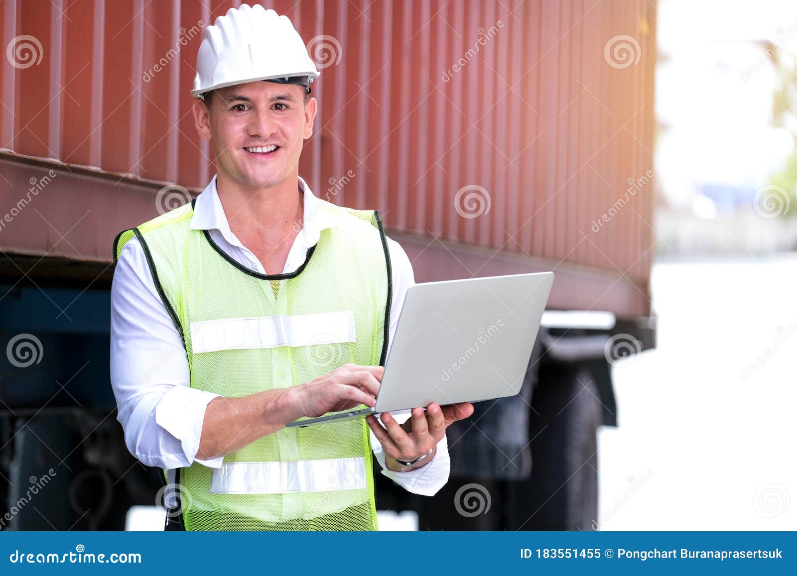 Engineer Worker Used a Laptop or Computer To Control Loading Containers ...