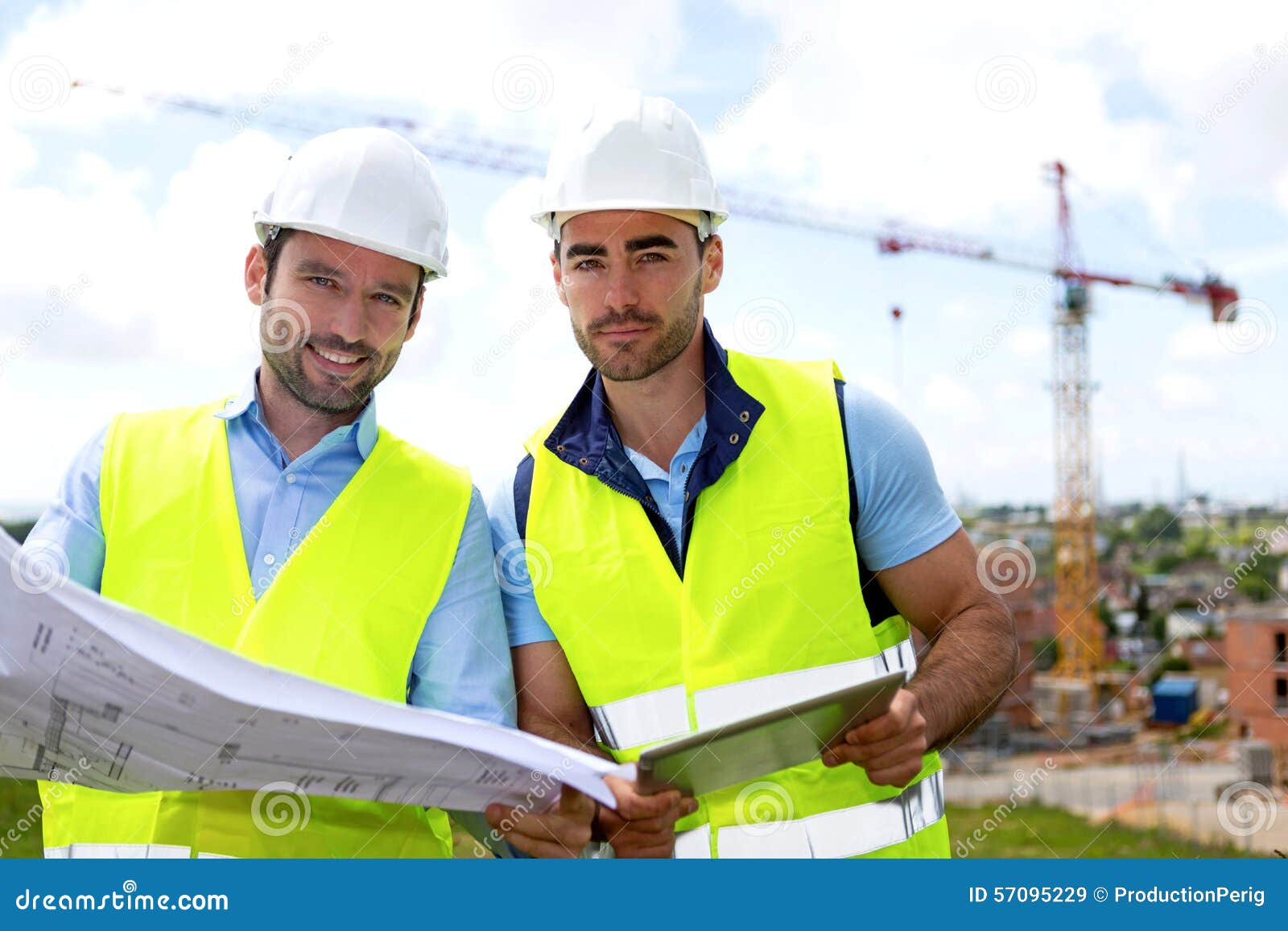 Engineer and Worker Watching Blueprint on Construction Site Stock Image ...