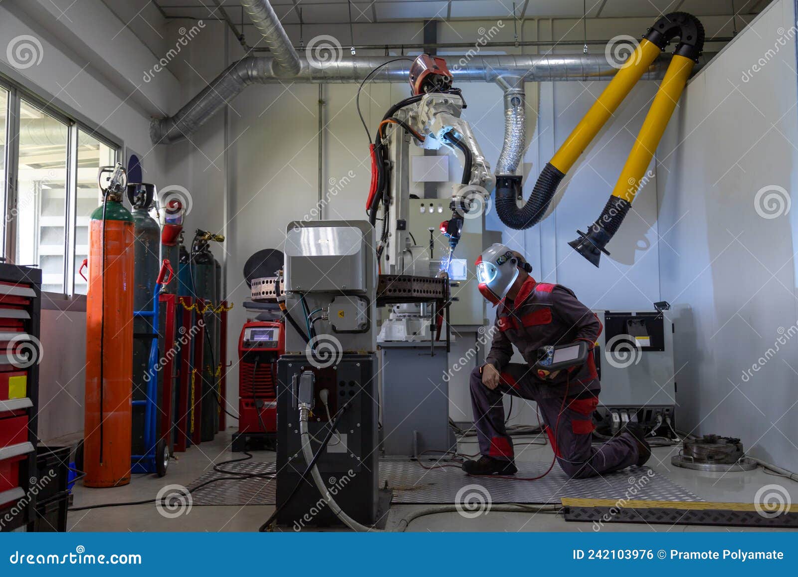 An Engineer or Worker Wear a Safety Mask Control the Smart Robot ...
