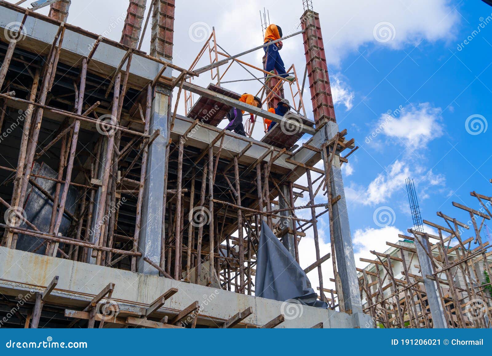 Engineer and Workers in Construction Team Building at Site Stock Image ...