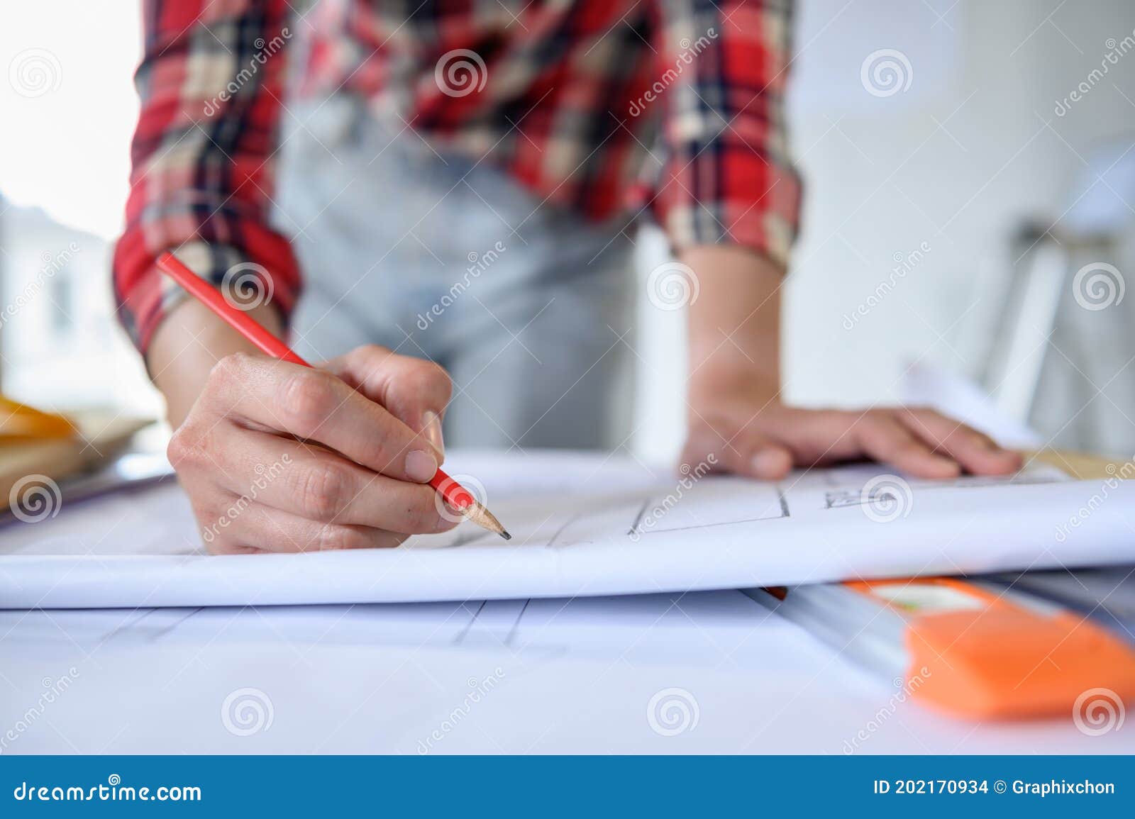 Engineer Working Alone at Construction Property Site. Architecture with ...