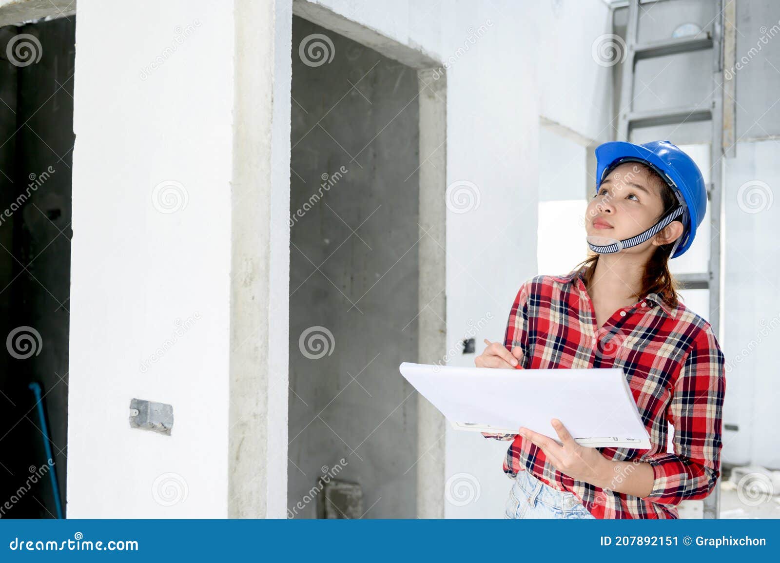 Engineer Working Alone at Construction Property Site. Architecture with ...