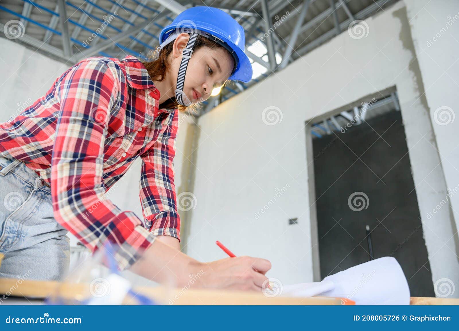 Engineer Working Alone at Construction Property Site. Architecture with ...