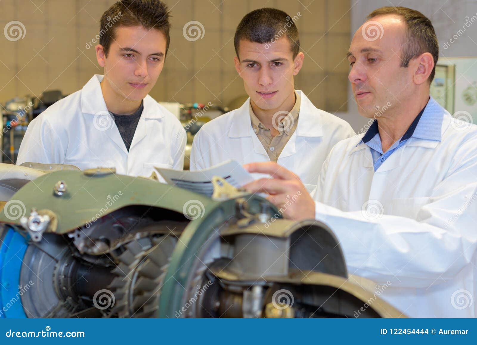 Engineer Working with Apprentices Stock Photo - Image of engineering ...