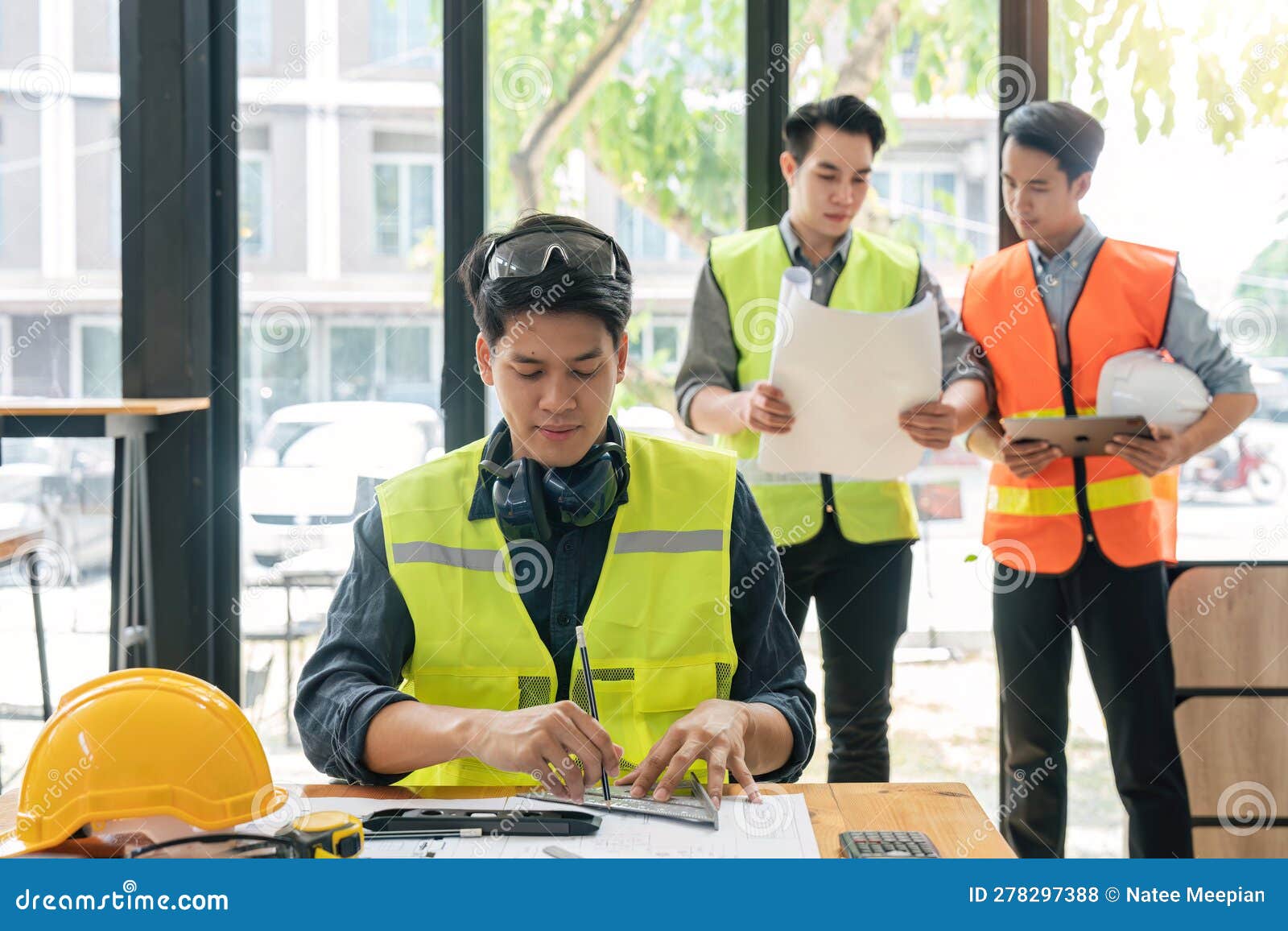 Engineer Working on Blueprints and Construction Plans. Building ...