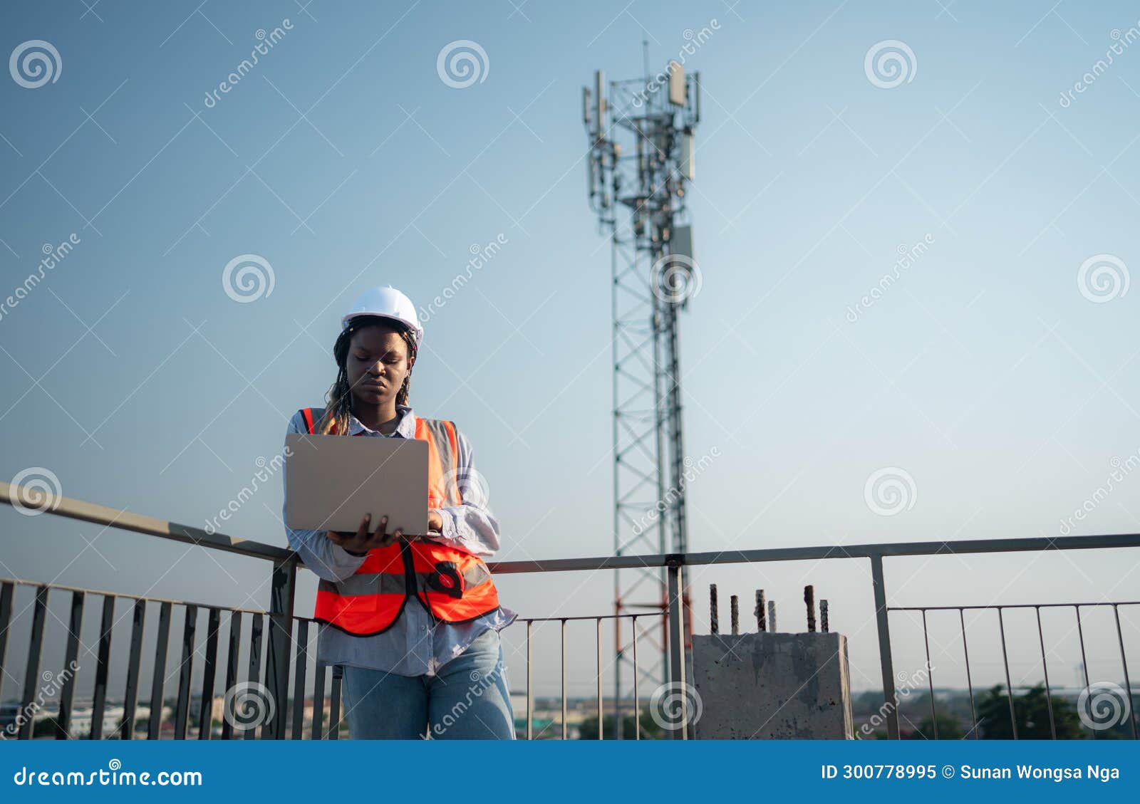 Engineer Working on a Building Site the Telephone and Internet Network ...