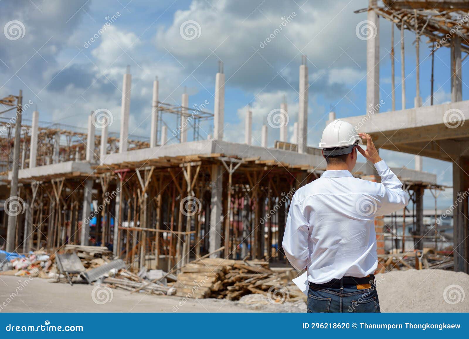 Engineer Working and Checking Plan on Construction Site Stock Photo ...