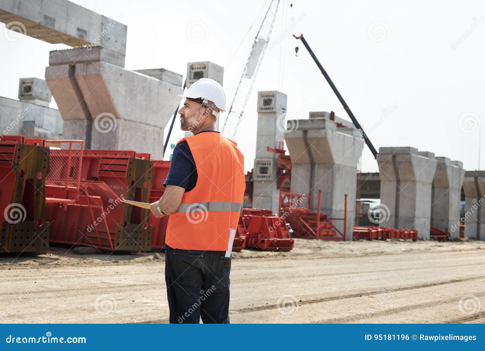 Engineer Working at Construction Site Stock Photo - Image of hardhat ...