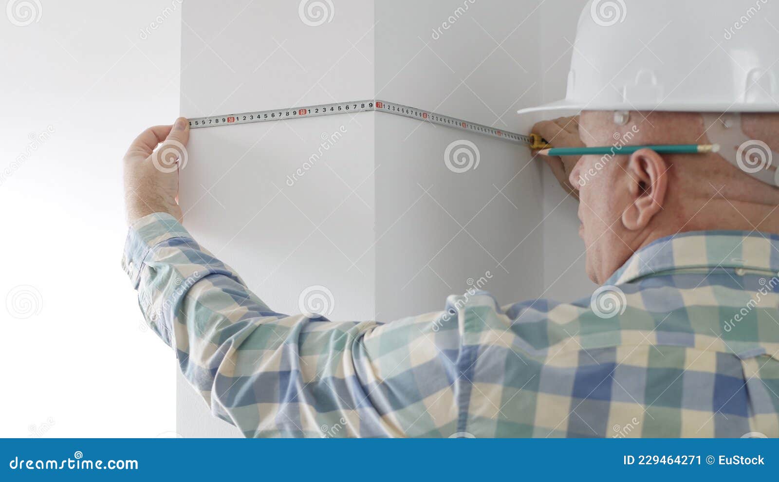 Engineer Working in a Construction Site Use a Tape Measure and Check ...
