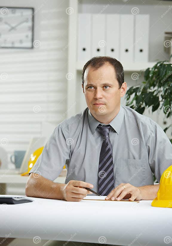 Engineer working at desk stock photo. Image of creative - 12702460
