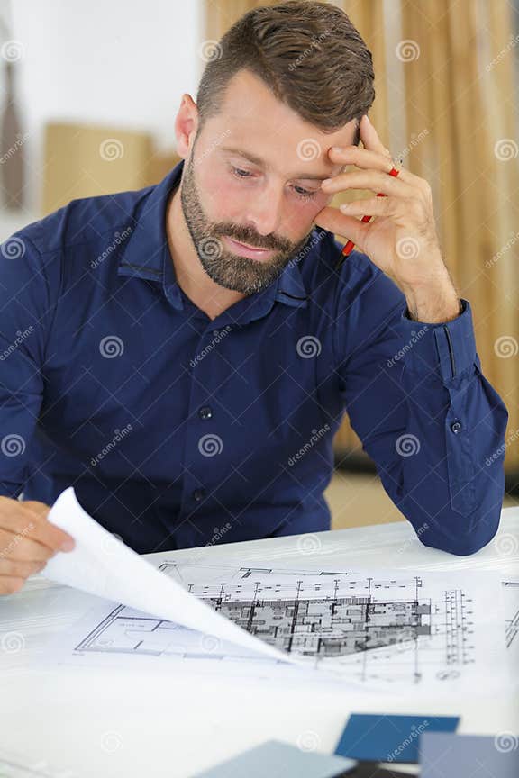Engineer Working on Desk with Drawing Plan Stock Photo - Image of ...