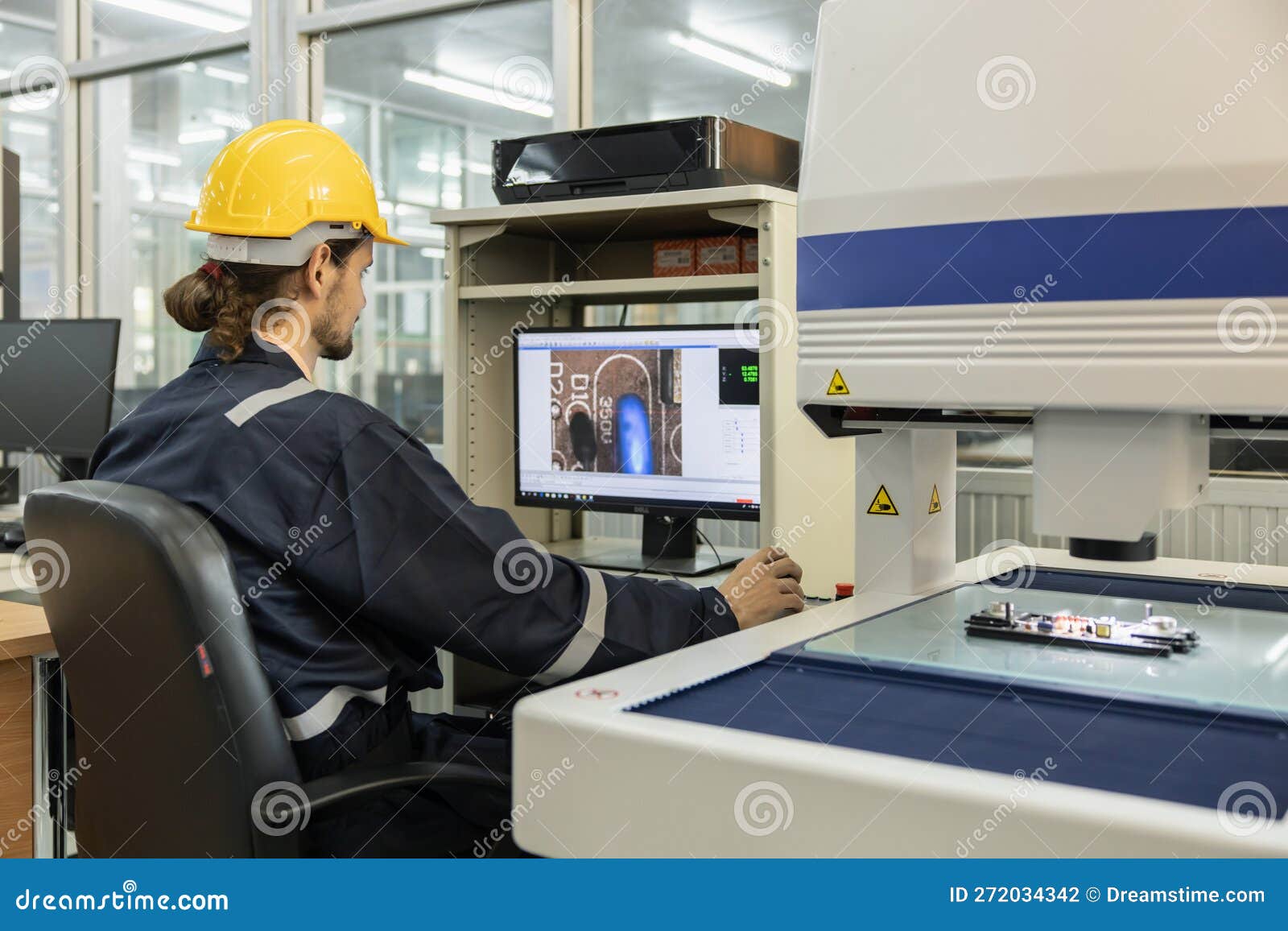 Engineer Working with Digital Microscope for Printed Circuit Board ...