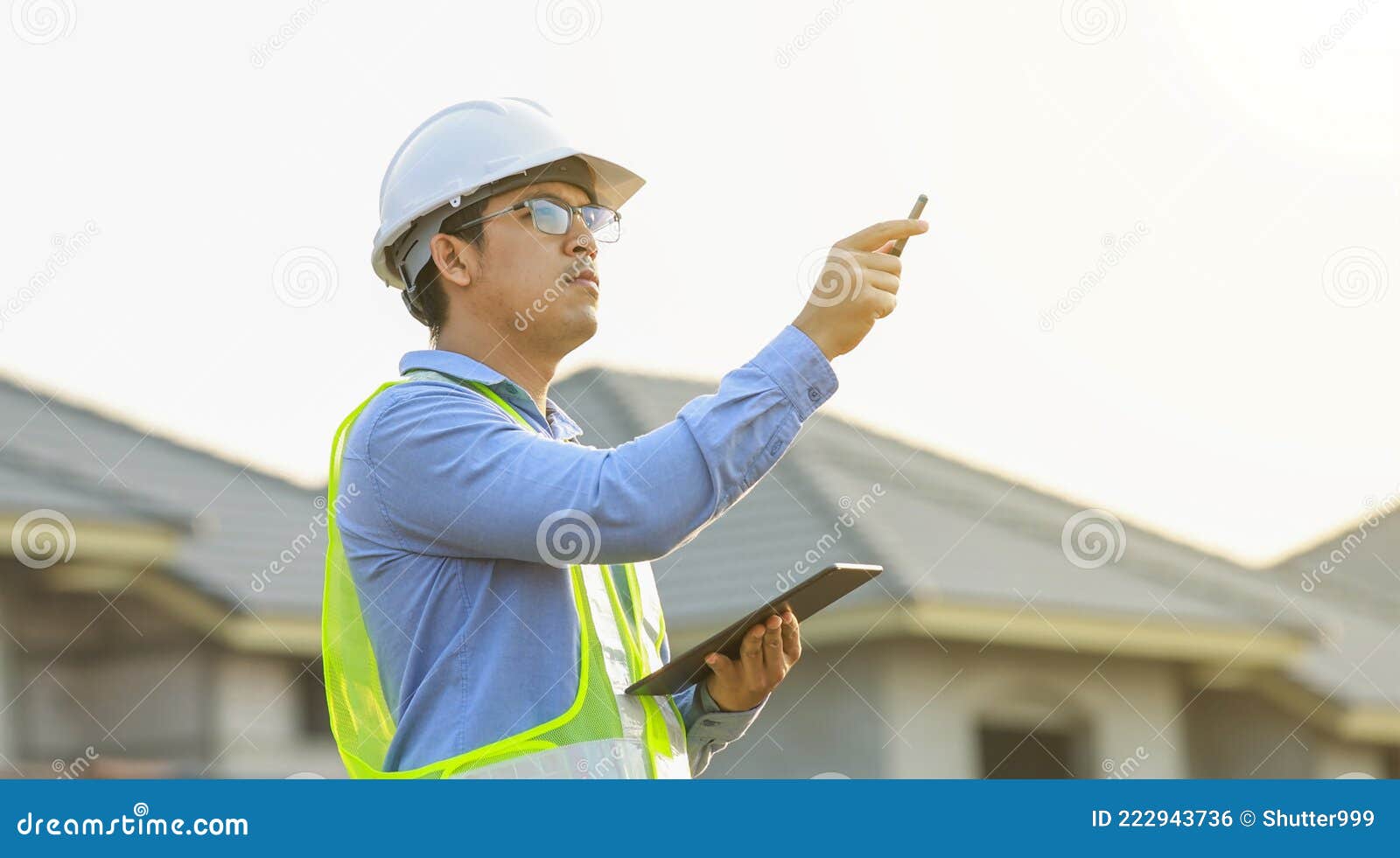 Engineer Working on Digital Tablet at Construction Site Stock Photo ...