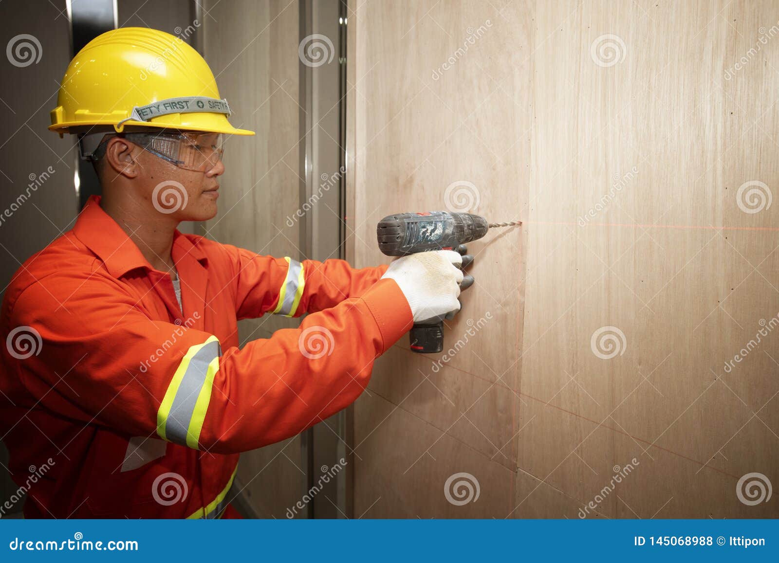 Engineer Working with Drill Stock Photo - Image of builder, industrial ...