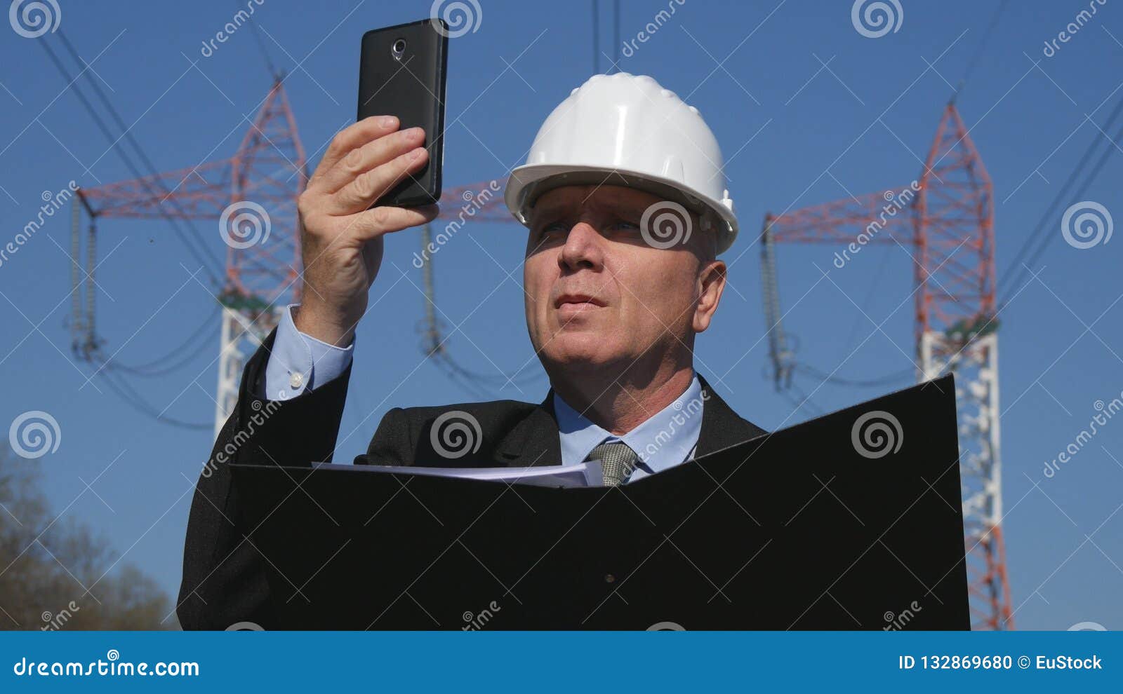 Engineer Working in Energetic Industry Use Cell Phone in Maintenance ...