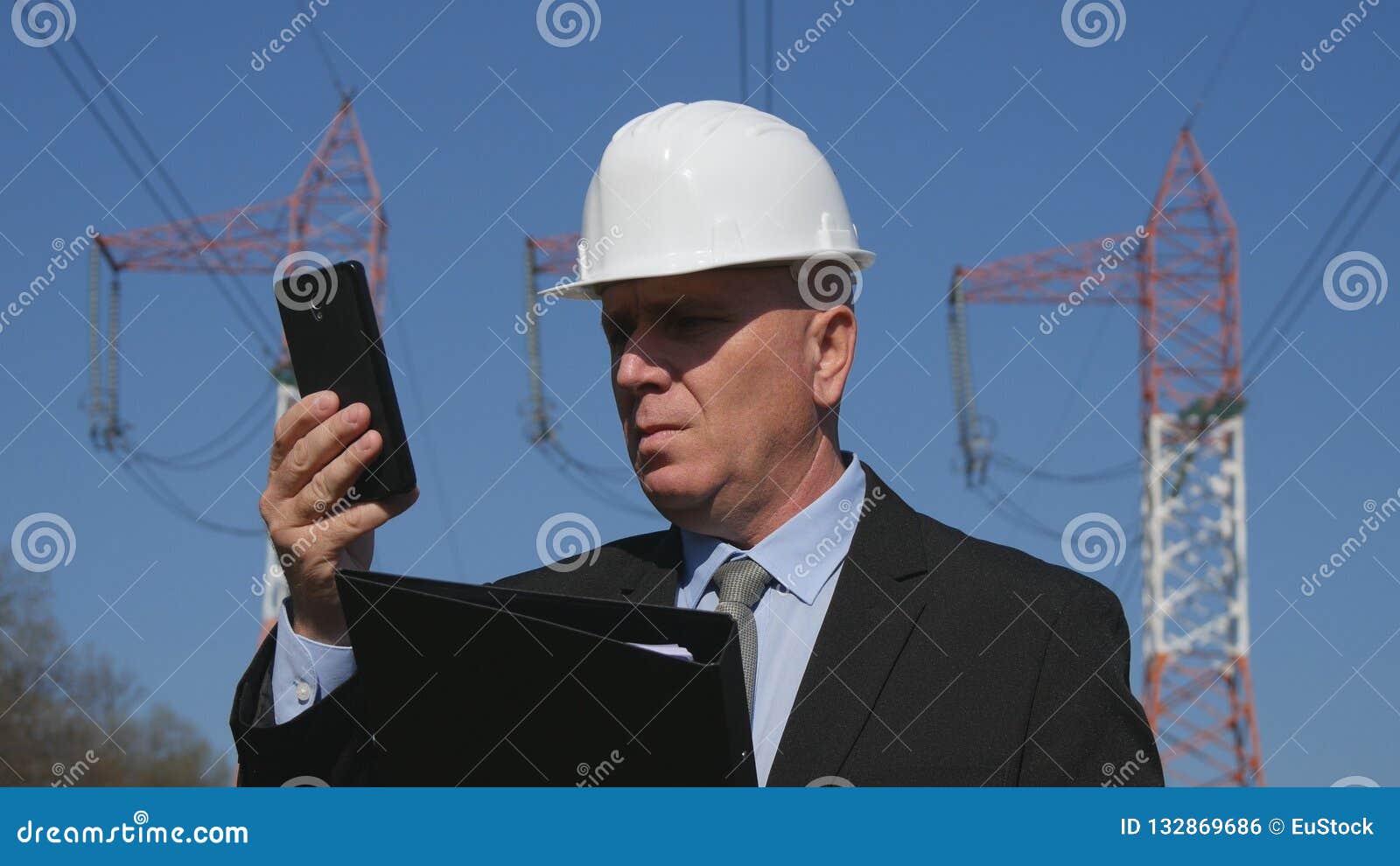 Engineer Working in Energetic Industry Use Cell Phone in Maintenance ...